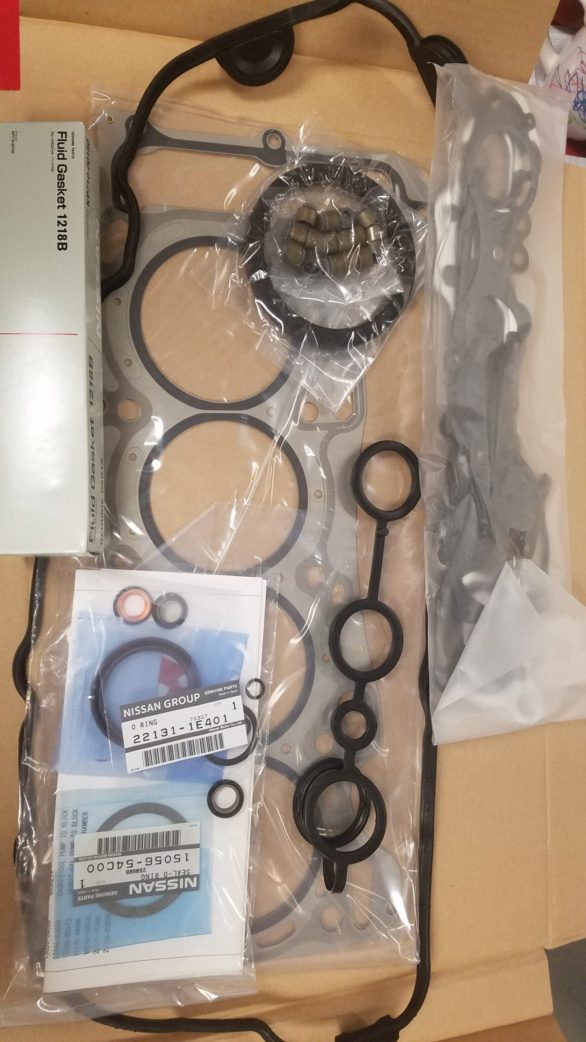 GENUINE OEM NISSAN FULL GASKET KIT - P12 SR20VE 10101-AW025