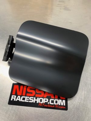 OEM NISSAN R34 GTR FUEL LID 78830-AA400 - Nissan Race Shop